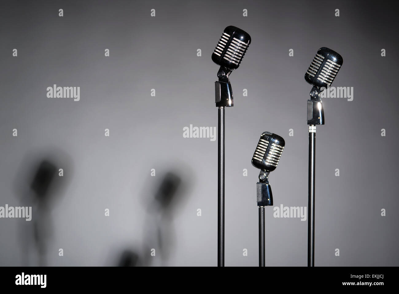Three retro microphones with space for text Stock Photo - Alamy