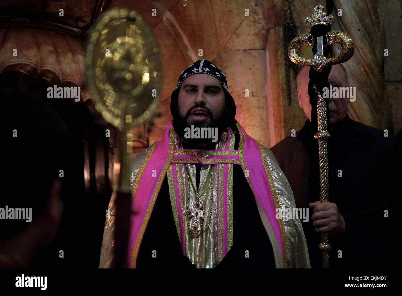 Arab Syriac Orthodox cleric holds an Eastern-style crosier with ...