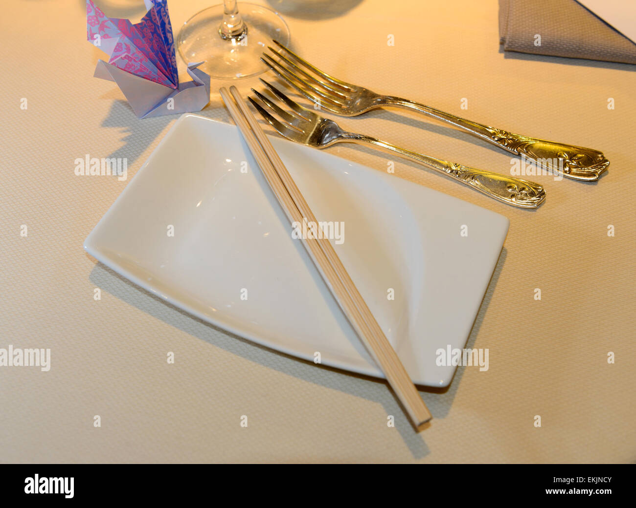 cutlery and plate in a restaurant Stock Photo - Alamy