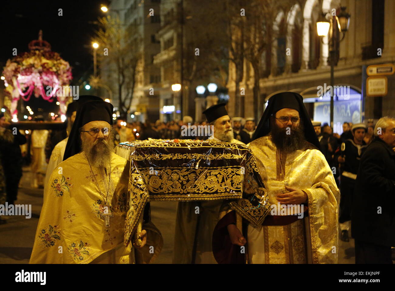 Athens, Greece. 10th April 2015. Greek Orthodox priests carry the ...
