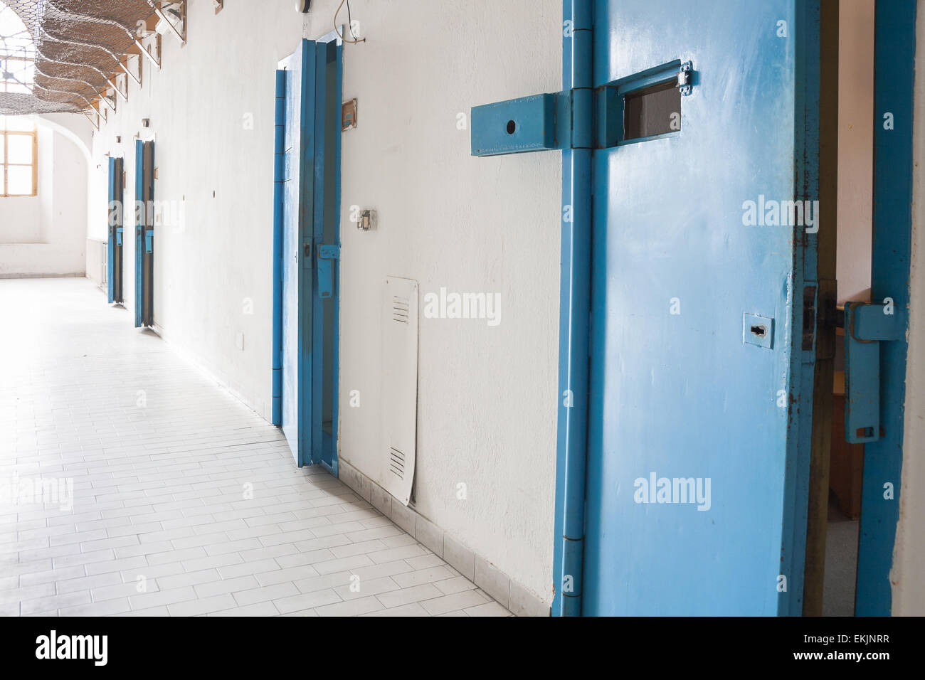 Line of armored doors. Four security doors Stock Photo - Alamy