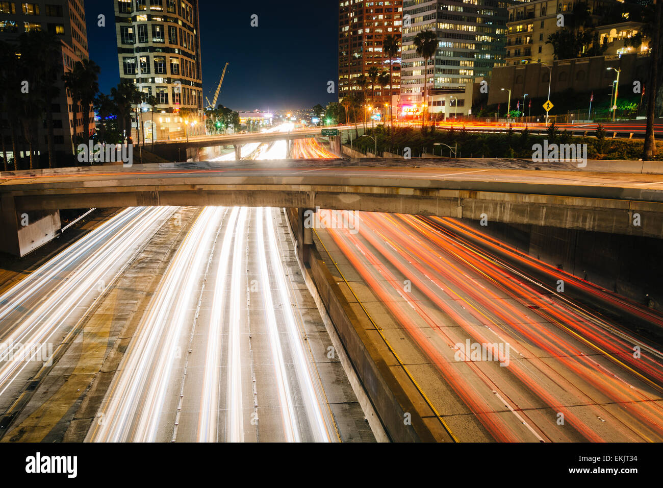 Traffic on the 110 Freeway and buildings in Los Angeles at night, seen ...