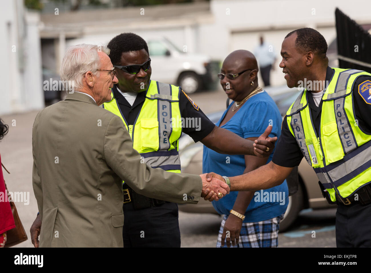 Charleston Mayor Joe Riley greets police officers standing outside the ...