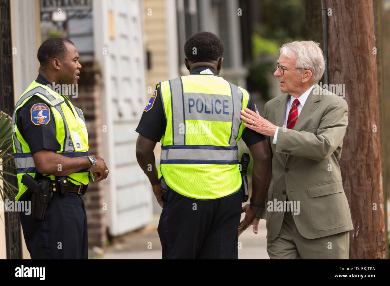 Charleston Mayor Joe Riley greets police officers standing outside the ...