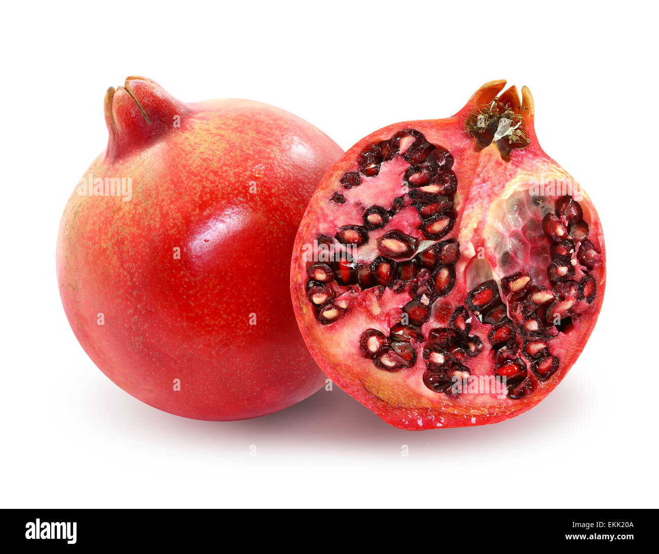bright delicious pomegranates isolated on a white background Stock ...