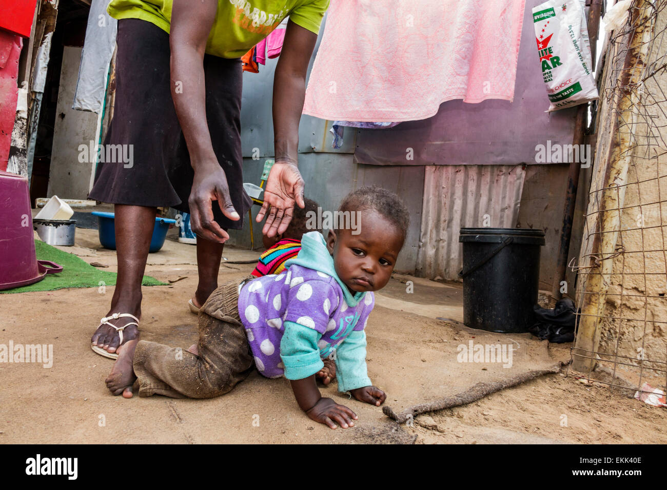 Boy crawling african floor hi-res stock photography and images - Alamy