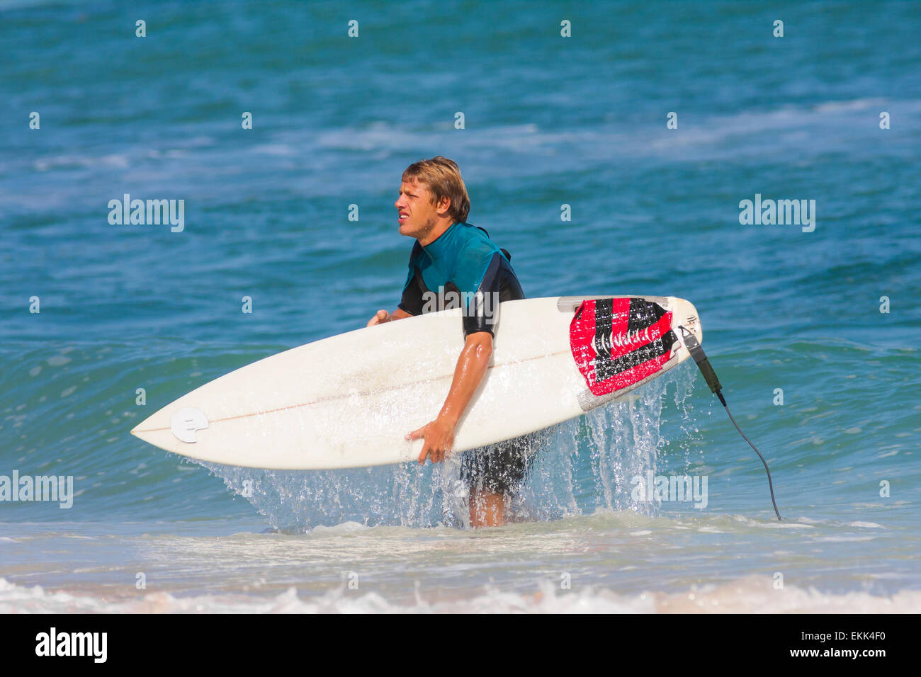 Young Surf Man Portrait at the Beach with a Surfboard Stock Photo - Alamy