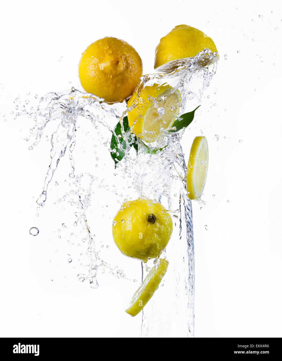 Lemon with water splash isolated on white Stock Photo - Alamy
