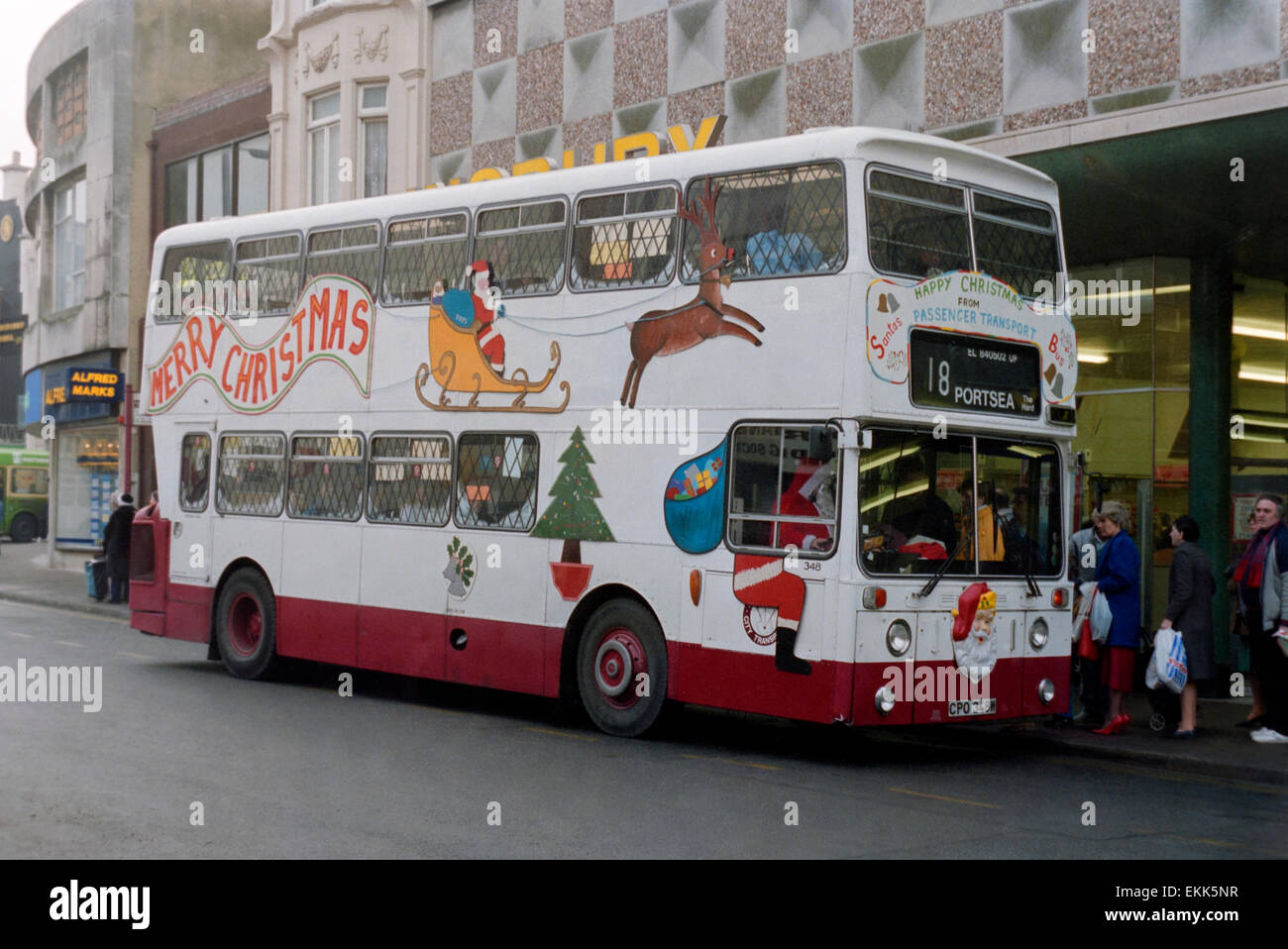 double decker bus decorated for christmas in operation in commercial ...