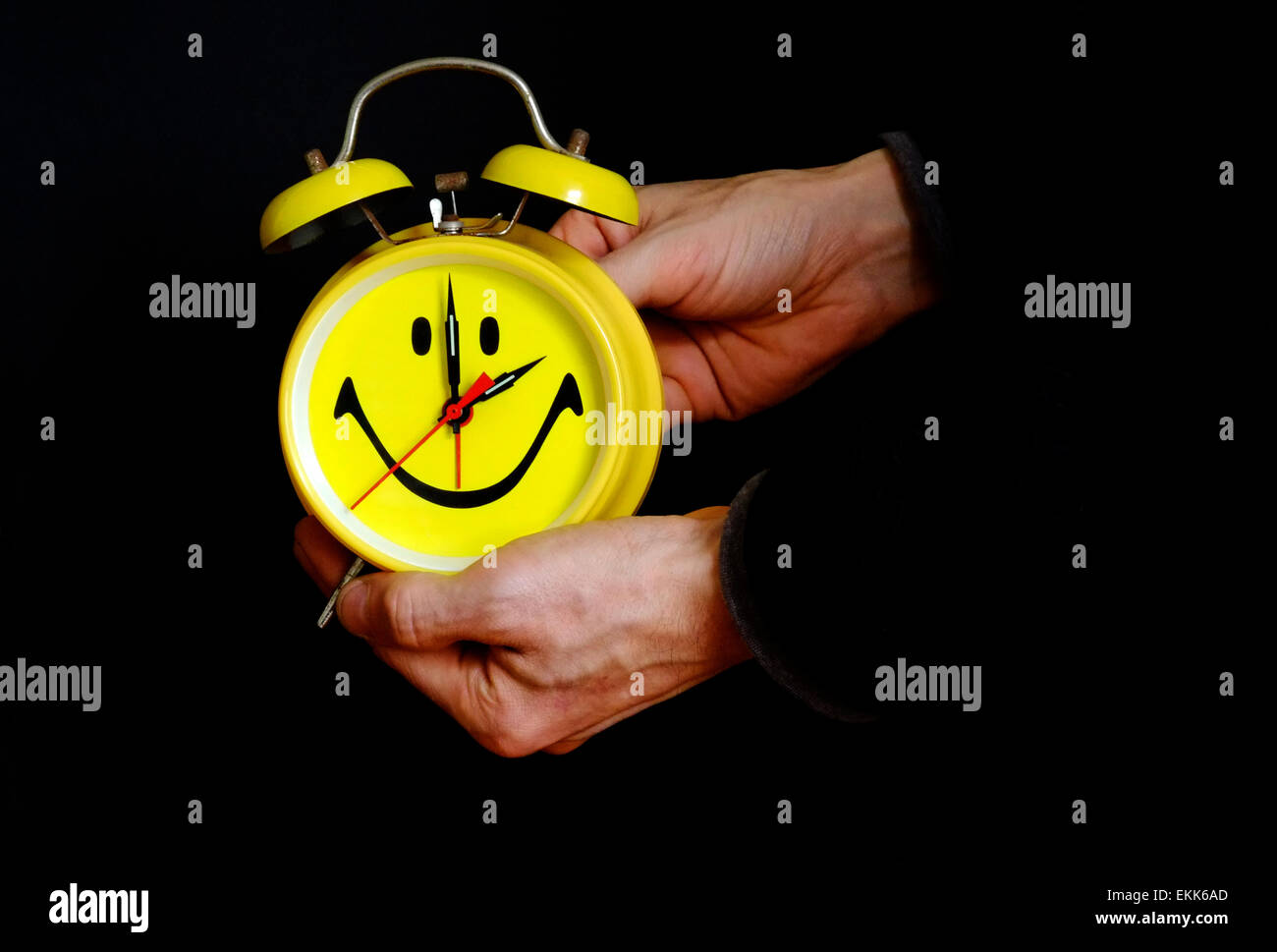 smiley clock with the time being set at two in the morning as british ...