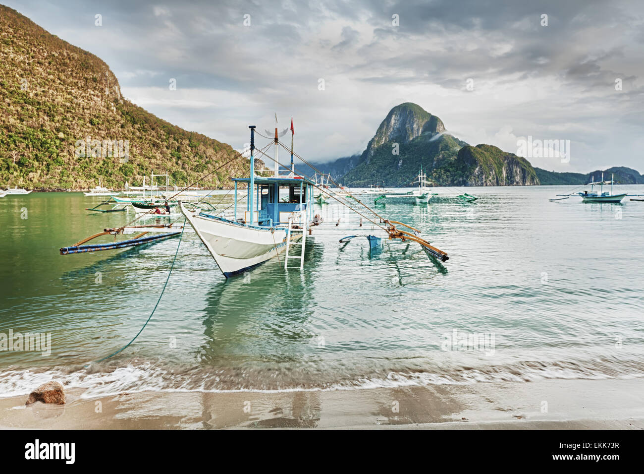 Traditional philippine boats bangka in lagoon of El Nido Stock Photo ...