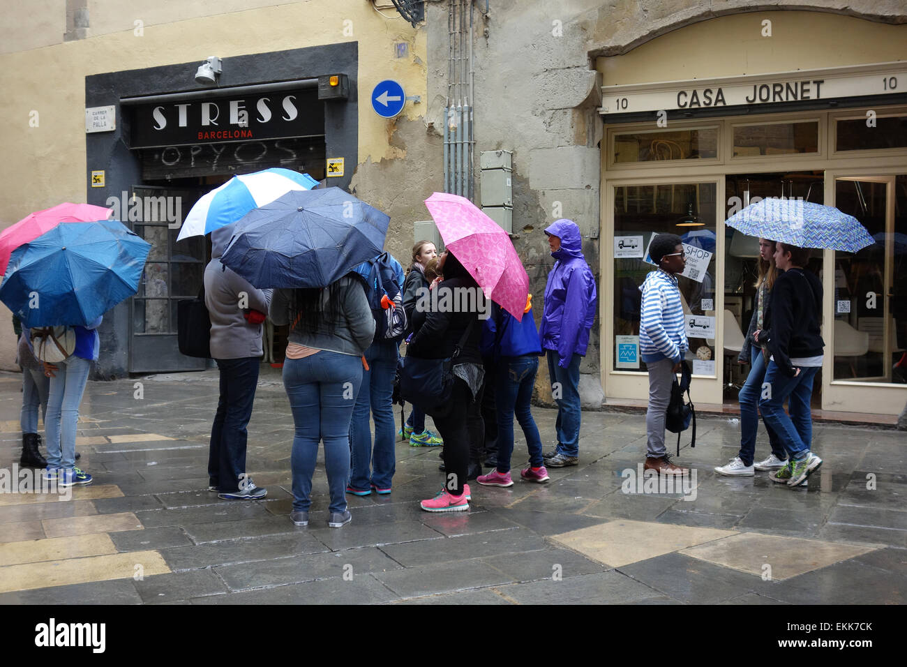 Group of people with umbrellas hi-res stock photography and images - Alamy