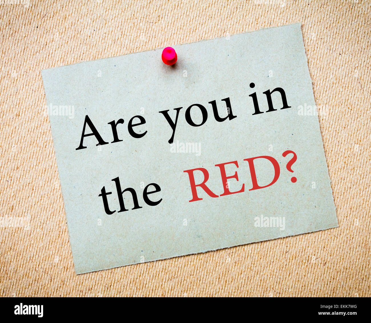 ARE YOU IN RED? Message. Recycled paper note pinned on cork board ...