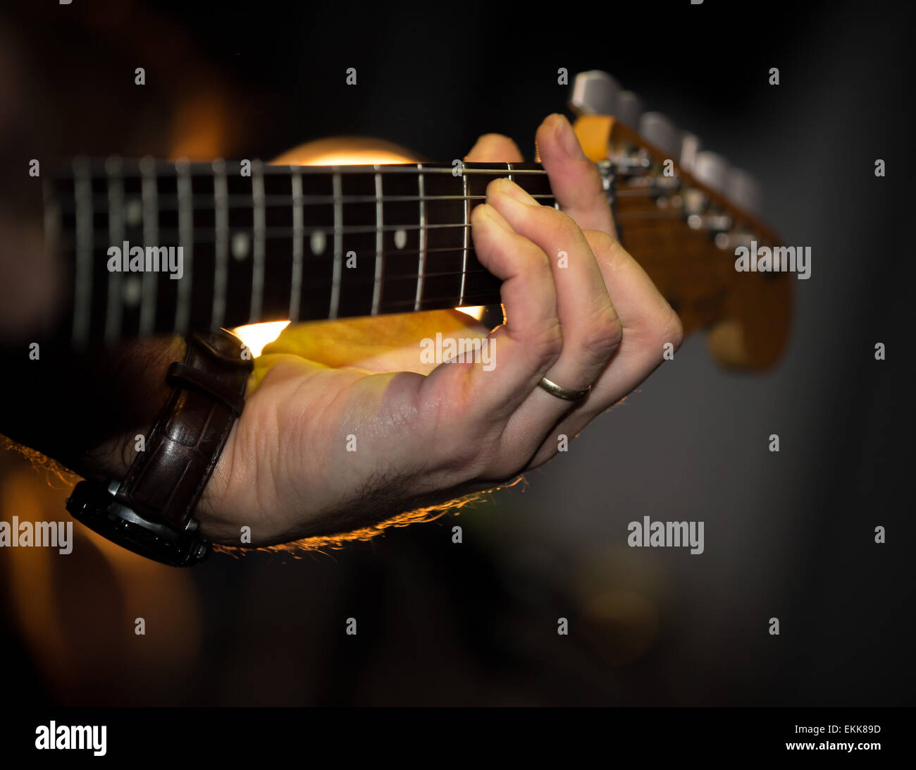 Man playing guitar, close-up Stock Photo - Alamy
