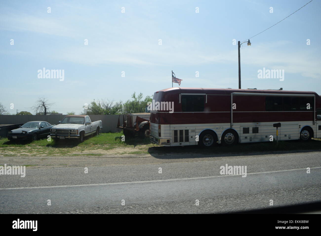 A bus behind a road Stock Photo - Alamy