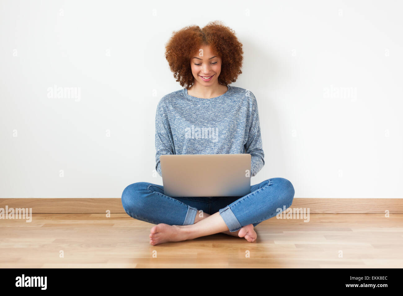 Black African American student girl using a laptop Stock Photo - Alamy