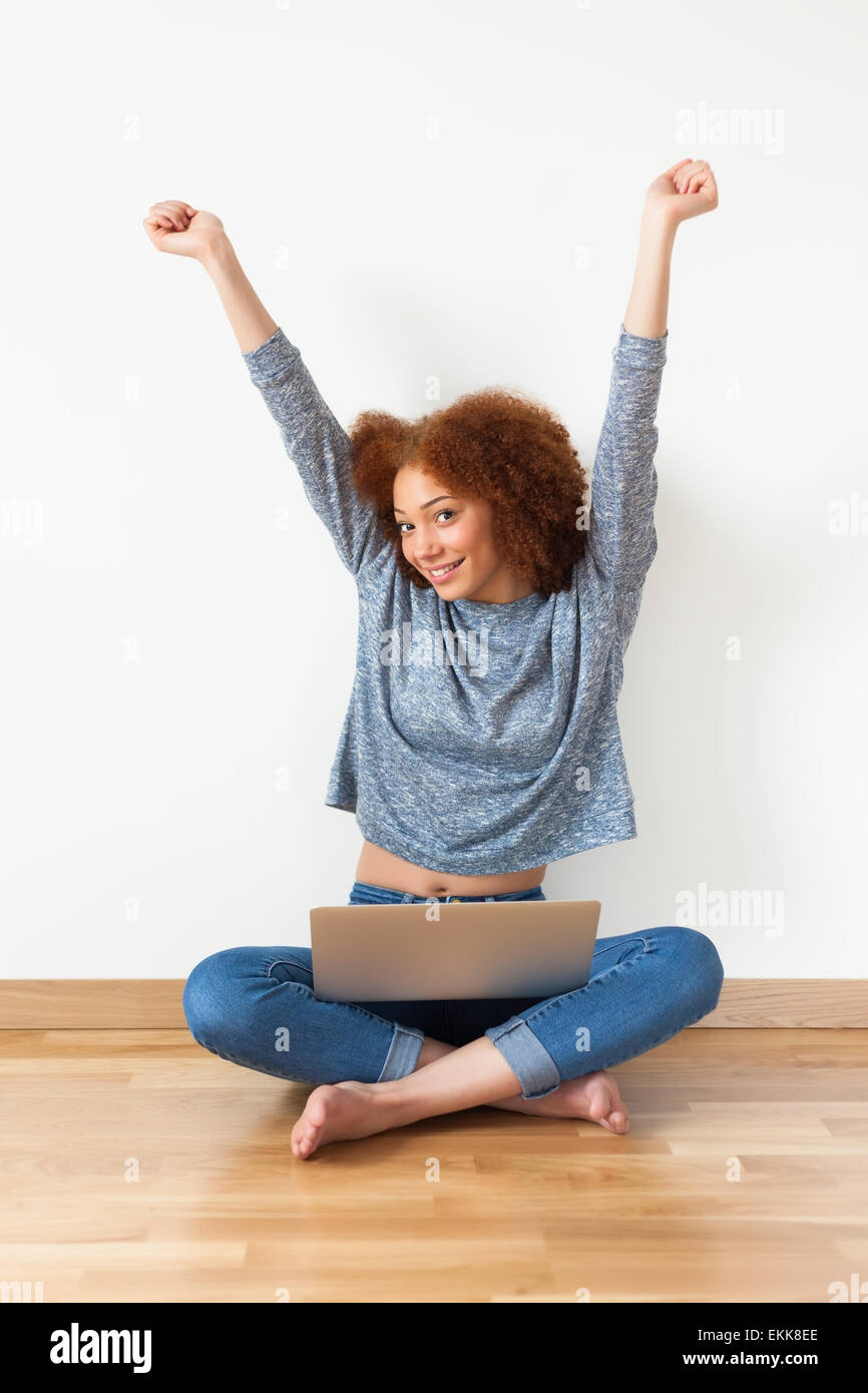 Black African American student girl using a laptop Stock Photo - Alamy