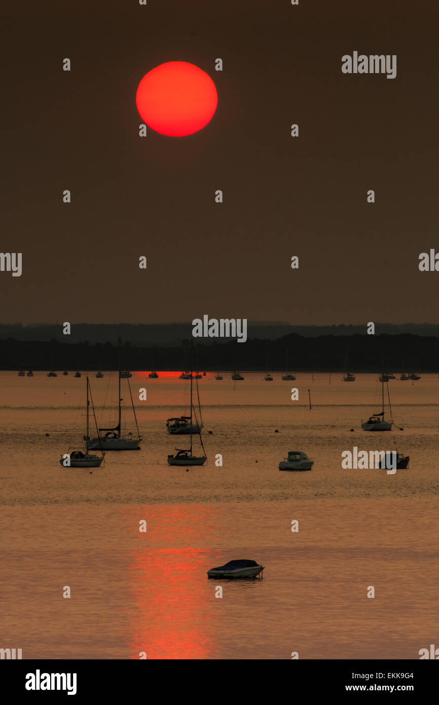 The setting sun illuminates the scene in one of the most beautiful ...