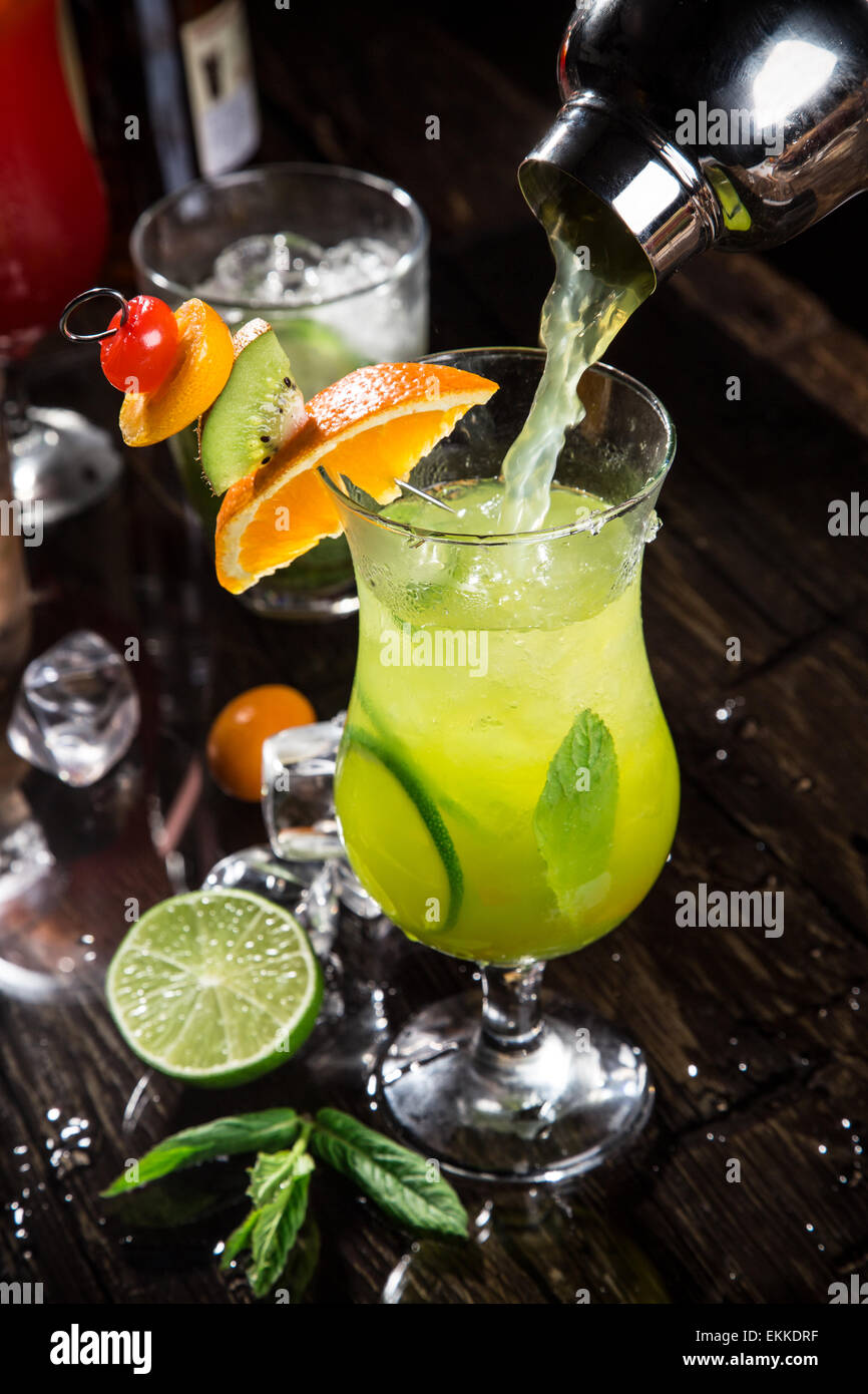 Pouring a cocktail into glass, close-up Stock Photo - Alamy