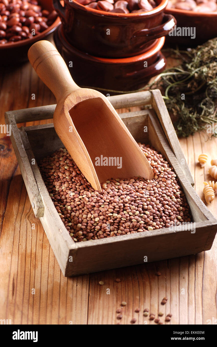 lentils in the box on the wooden table Stock Photo - Alamy