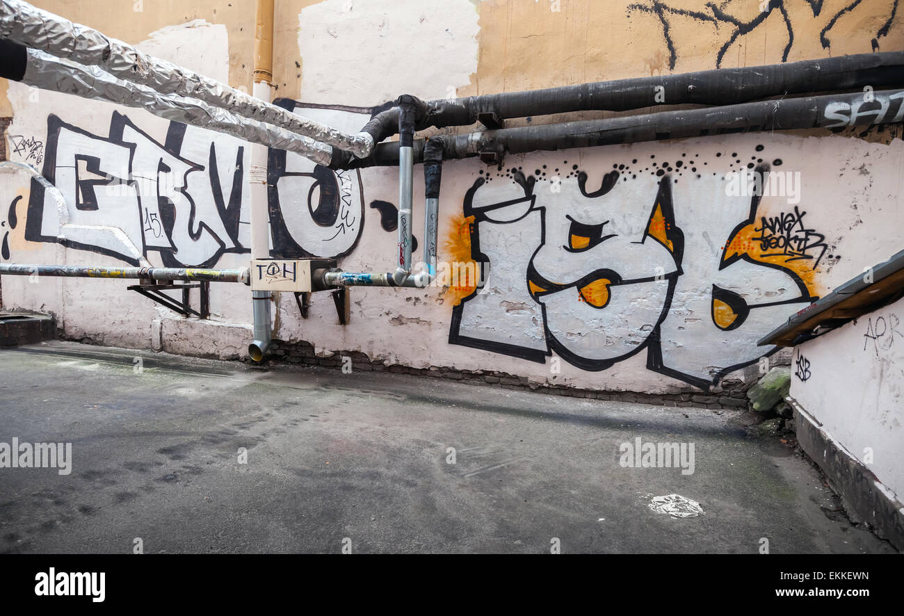 Saint-Petersburg, Russia - April 7, 2015: Graffiti fragments with ...