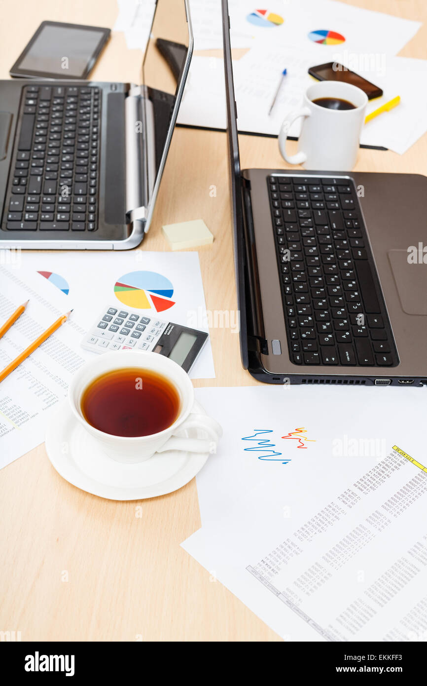 business workflow - table with tools in modern office Stock Photo - Alamy