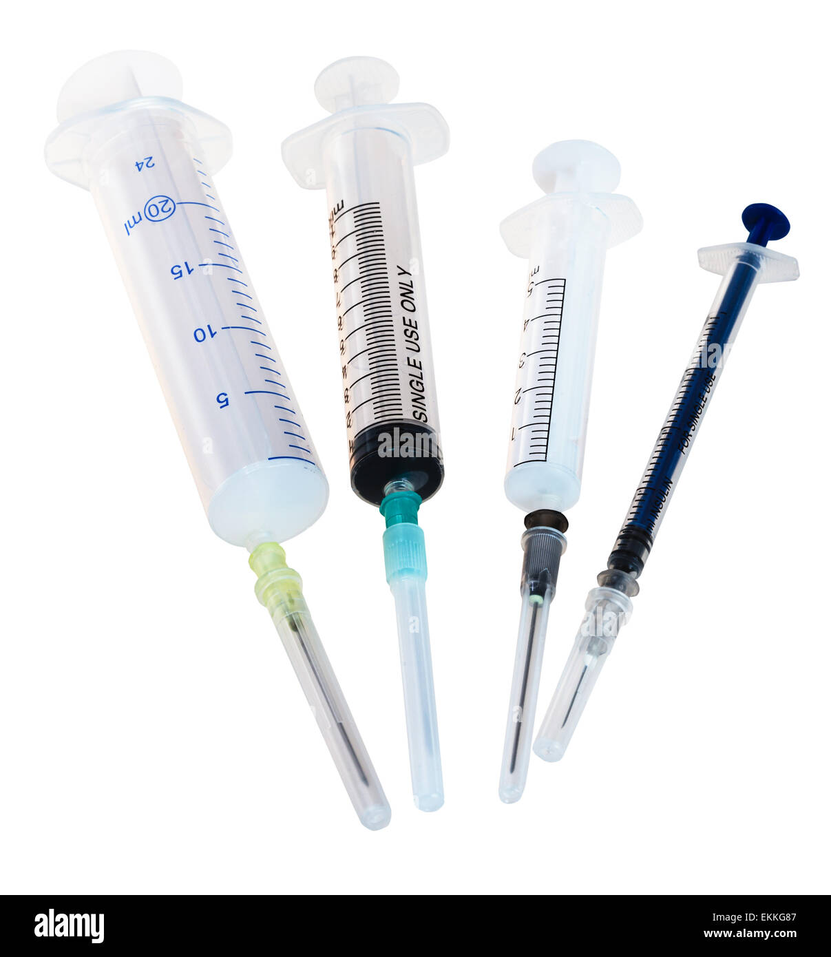 four new empty medical plastic disposable syringes isolated on white ...