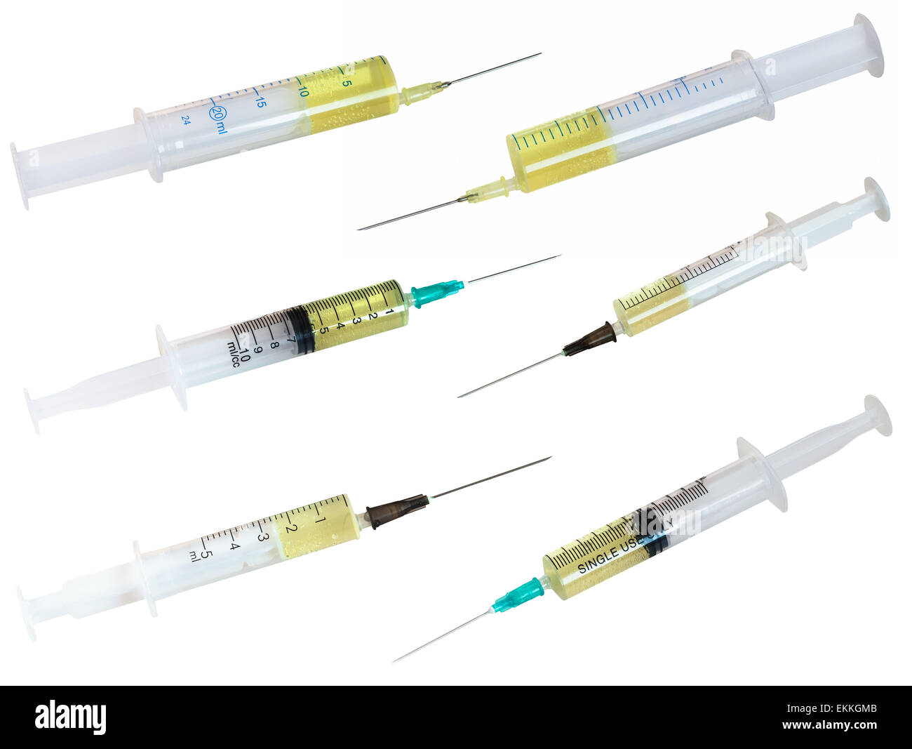 set of syringes filled with yellow liquid isolated on white background ...