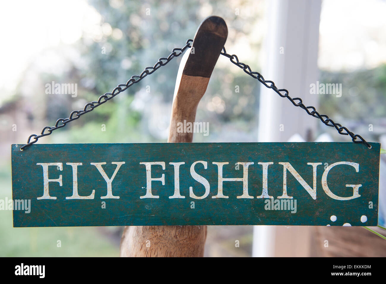 A fly fishing sign Stock Photo - Alamy