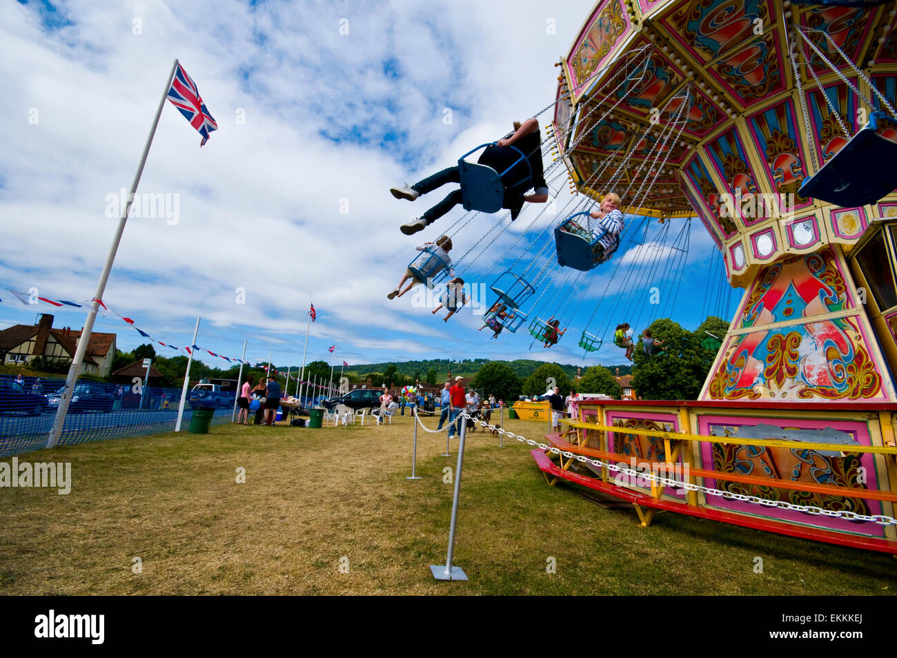 An old fashioned fun fair on an English summer's day Stock Photo - Alamy