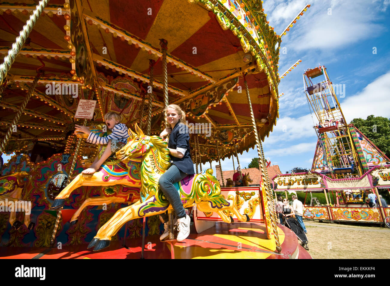 An old fashioned fun fair on an English summer's day Stock Photo - Alamy