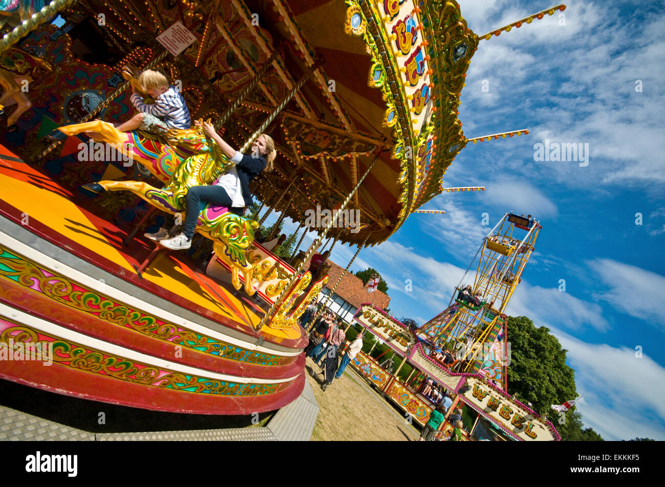 An old fashioned fun fair on an English summer's day Stock Photo - Alamy
