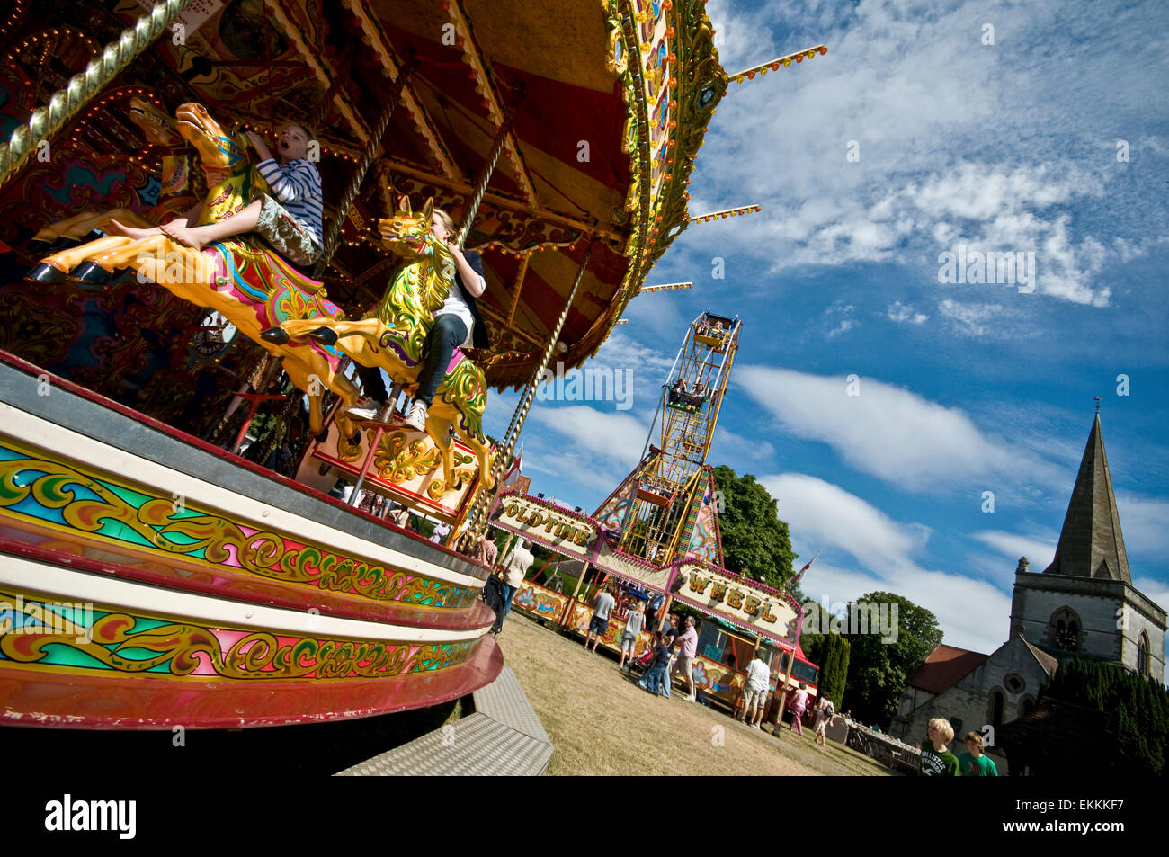 An old fashioned fun fair on an English summer's day Stock Photo - Alamy