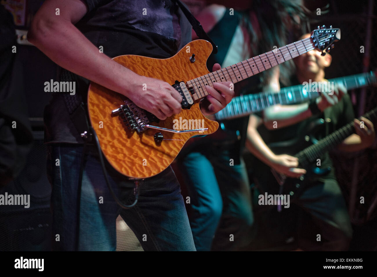 Guys playing rock-and-roll all together. Selective focus Stock Photo ...