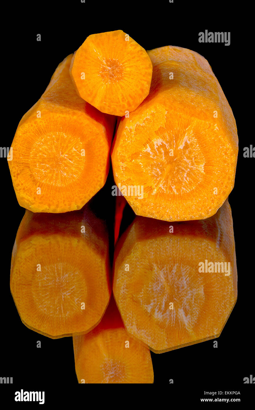 Cut carrot ends and reflection Stock Photo - Alamy
