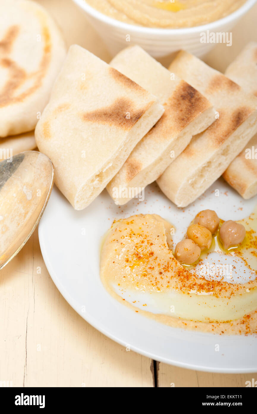 traditional chickpeas Hummus with pita bread and paprika on top Stock ...