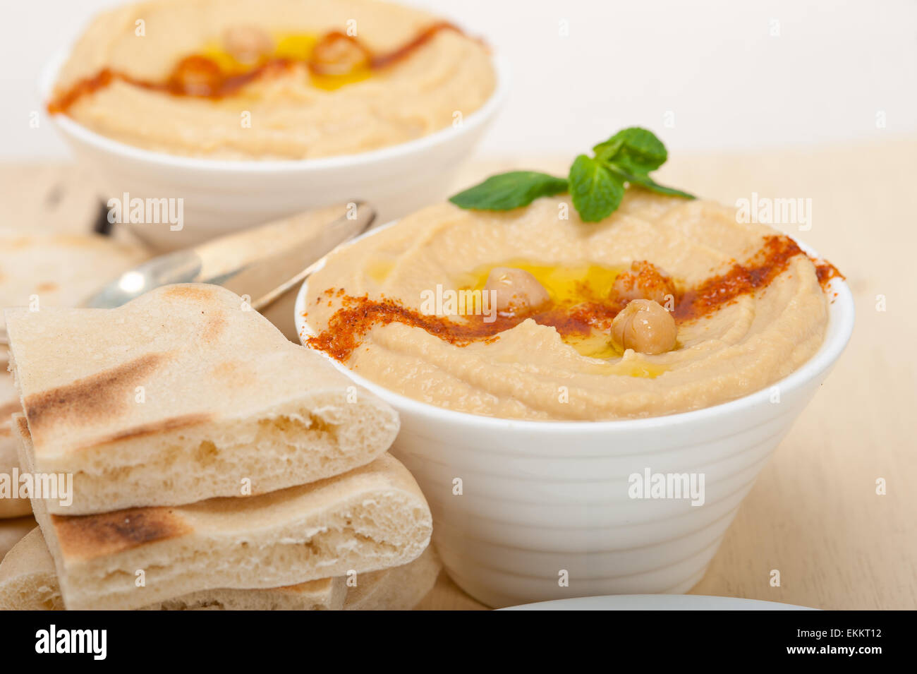 traditional chickpeas Hummus with pita bread and paprika on top Stock ...