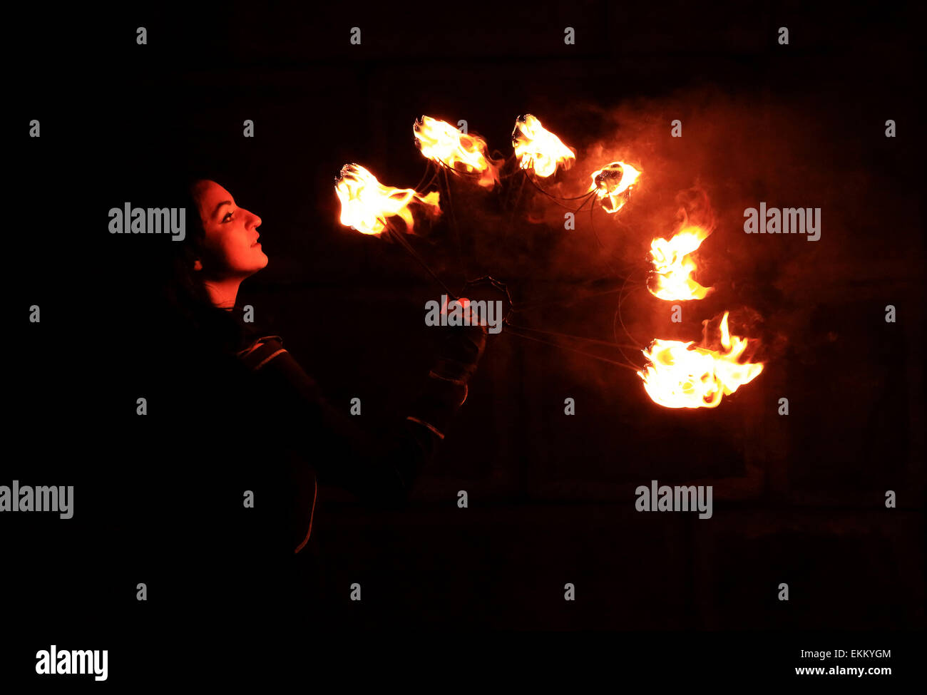 Woman holds in his hand the fire Stock Photo - Alamy