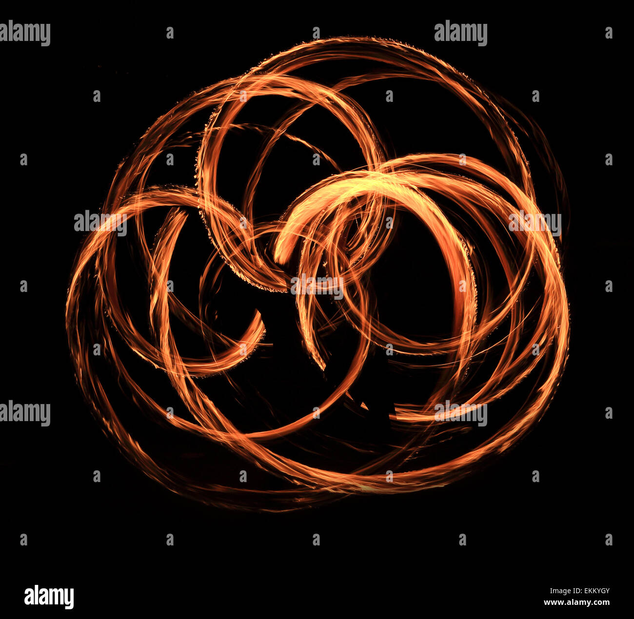 Fire show flaming trails, background Stock Photo - Alamy