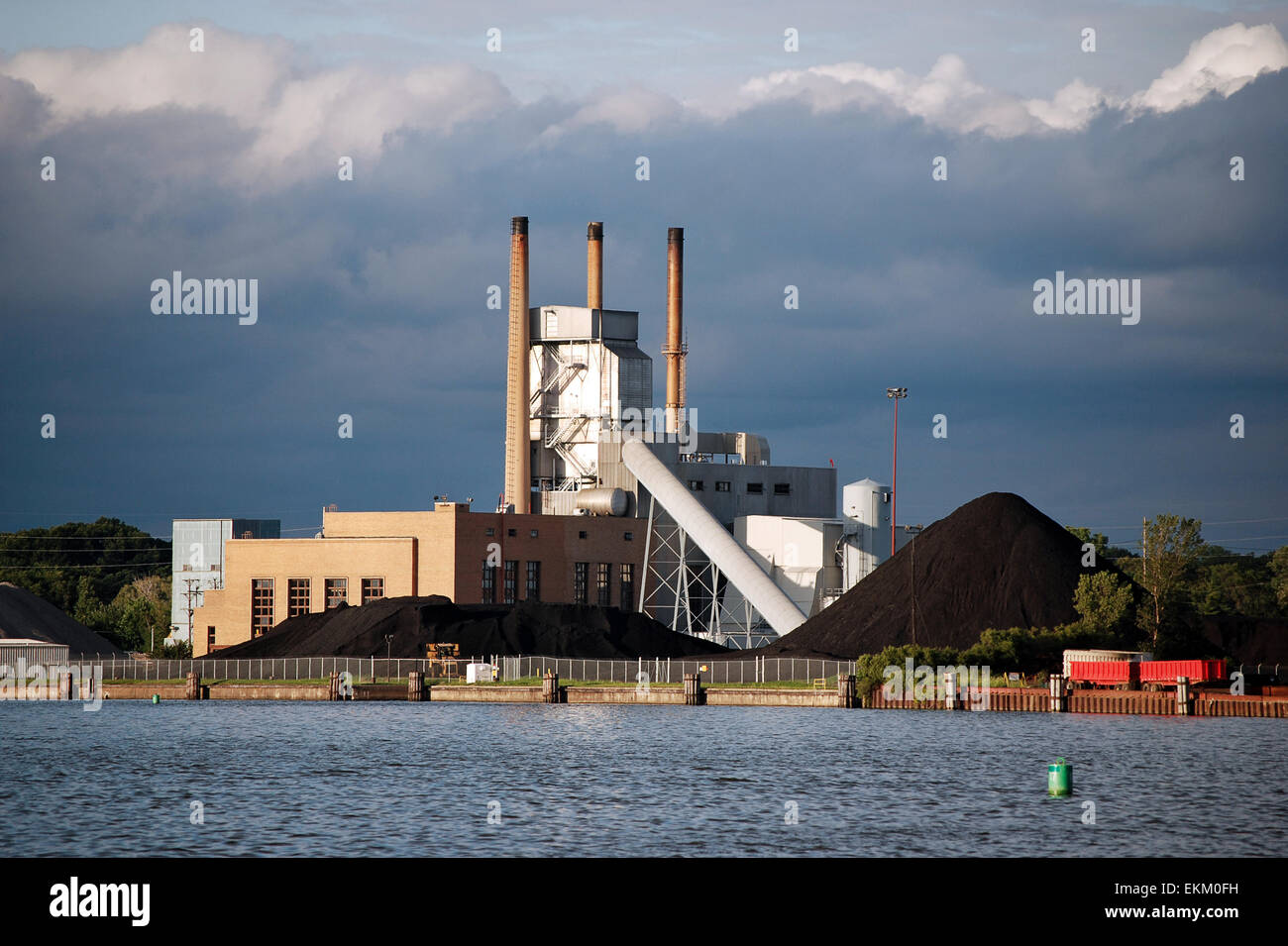 Coal piles by industrial factory on the waterfront in Michigan Stock ...