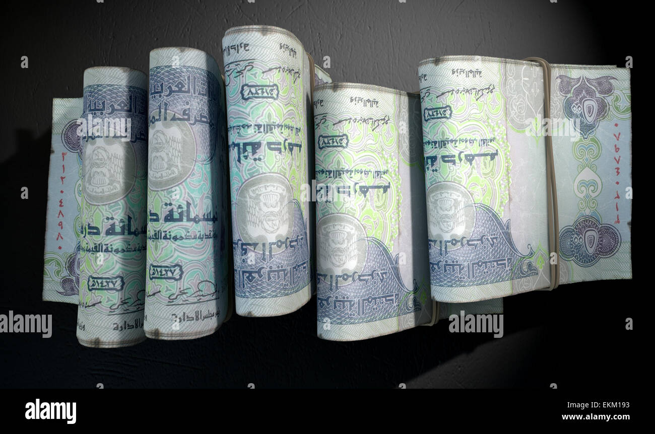 A close-up view of five wads of folded over stacks of dirham banknotes ...