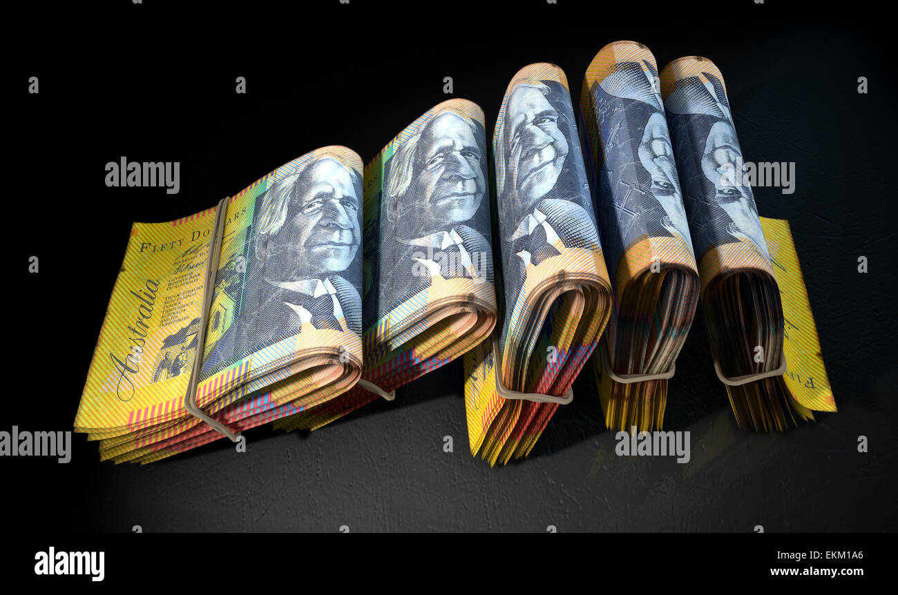 A close-up view of five wads of folded over stacks of australian dollar ...