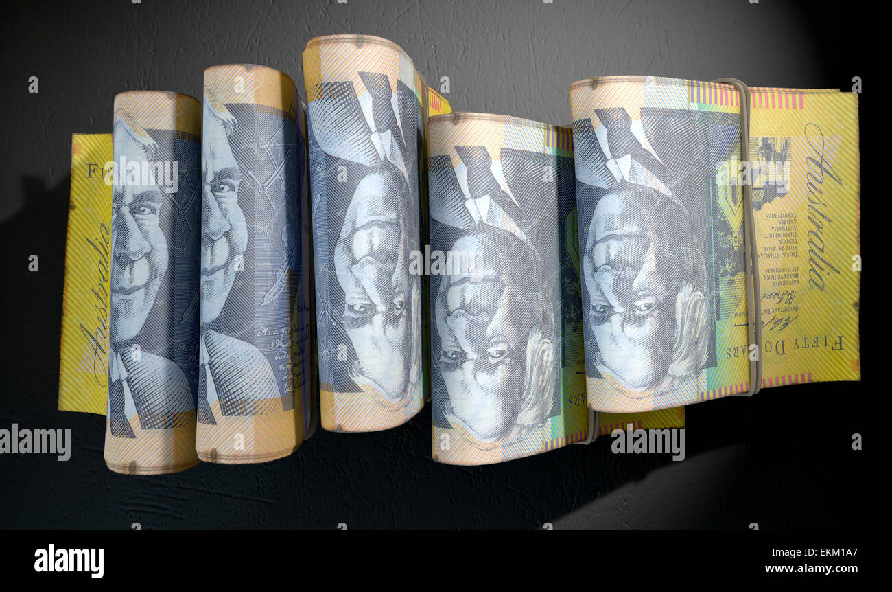 A close-up view of five wads of folded over stacks of australian dollar ...