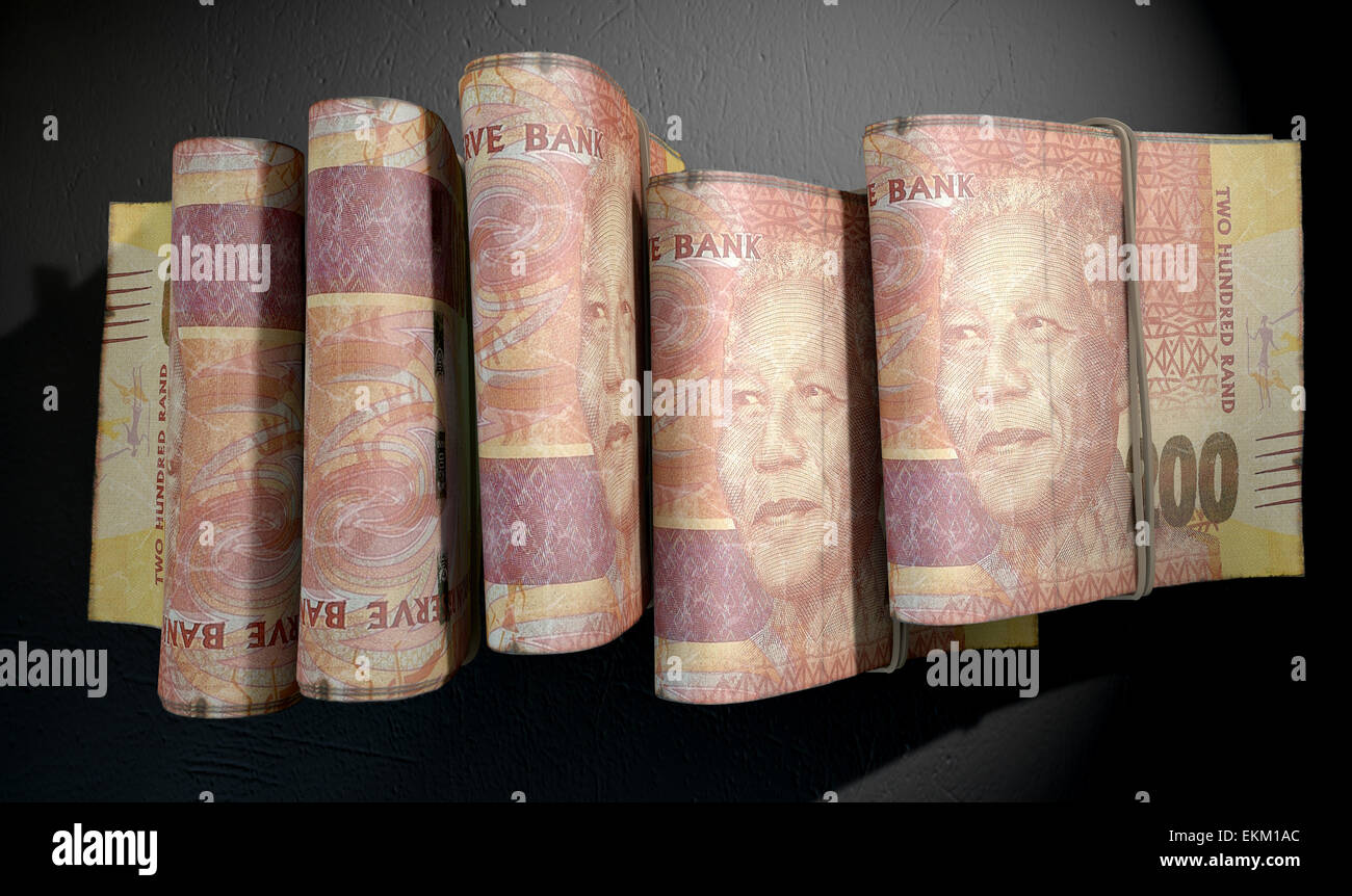 A close-up view of five wads of folded over stacks of south african ...