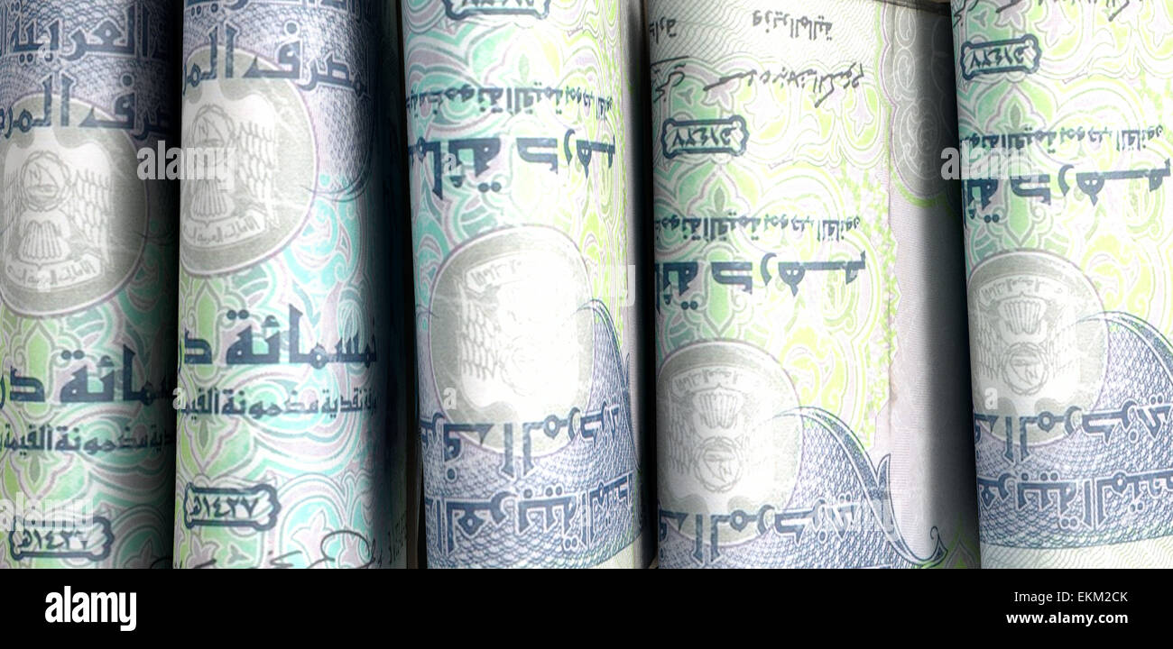 A close-up view of five wads of folded over stacks of dirham banknotes ...