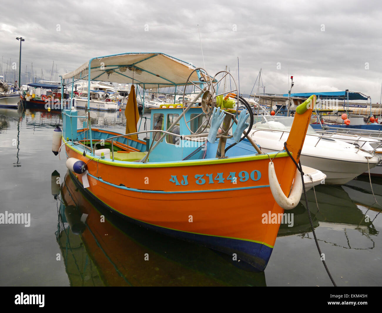 Orange fishing boat hi-res stock photography and images - Alamy