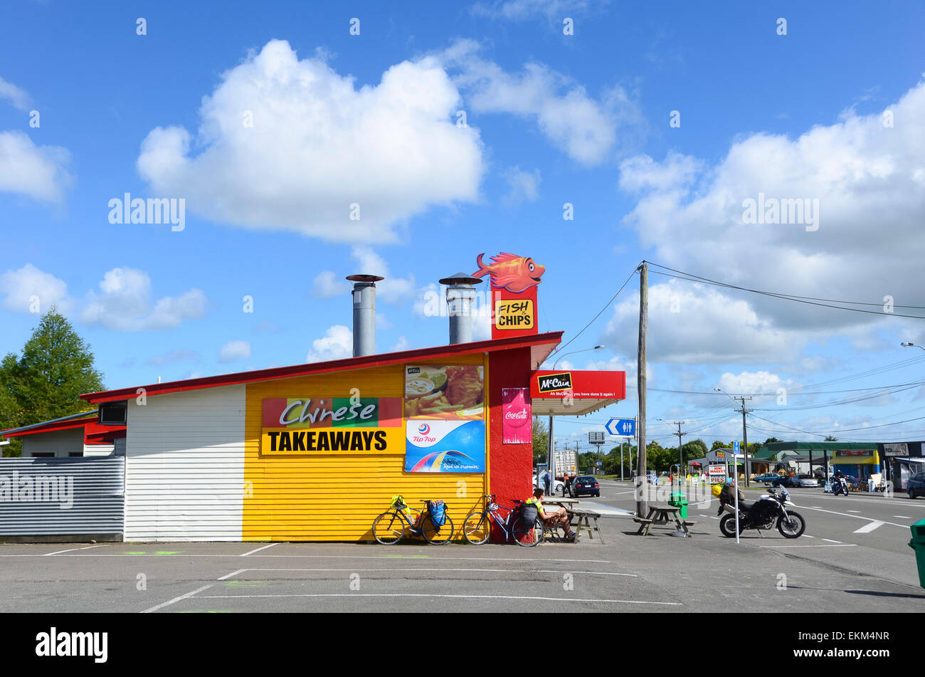 Bicycles outside red and yellow Chinese Takeaway and Fish and Chip shop ...