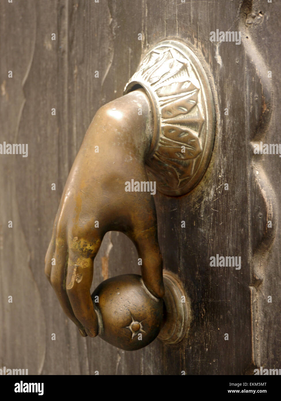An unusual hand shaped door handle on a building in Palma, Majorca ...