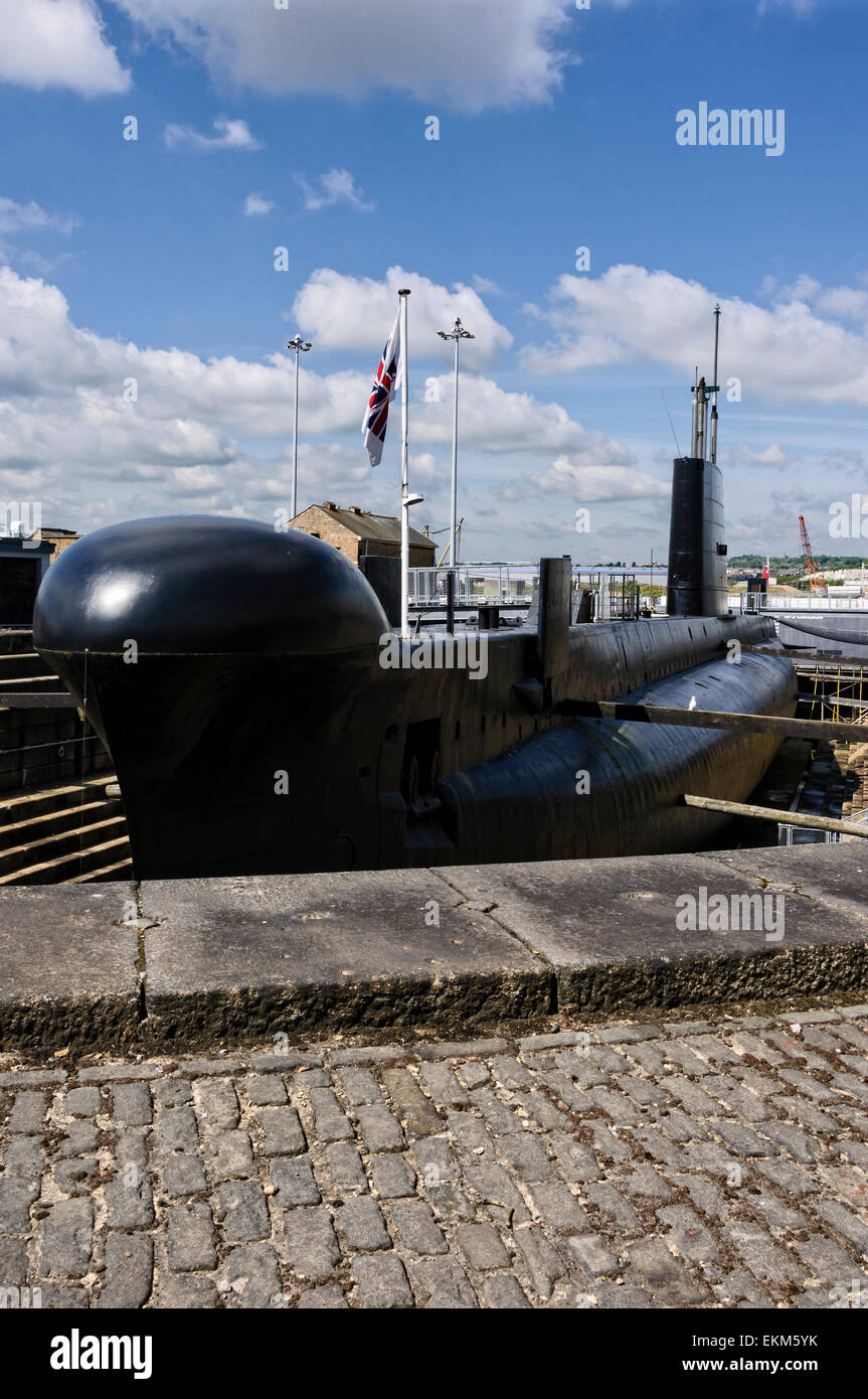 A bulbous sonar dome at the bow and a tall slim tower carrying ...
