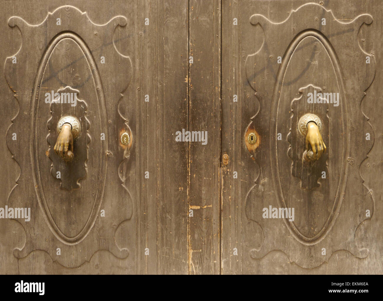 An unusual hand shaped door handle on a building in Palma, Majorca ...